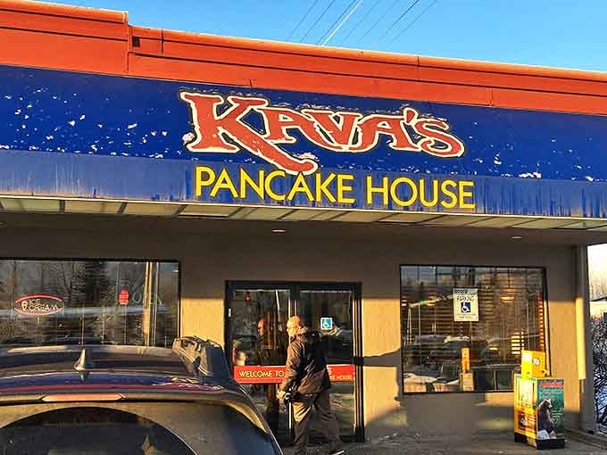 The welcoming blue signage glows against the Alaskan sky &ndash; a morning promise that good things await those who enter.