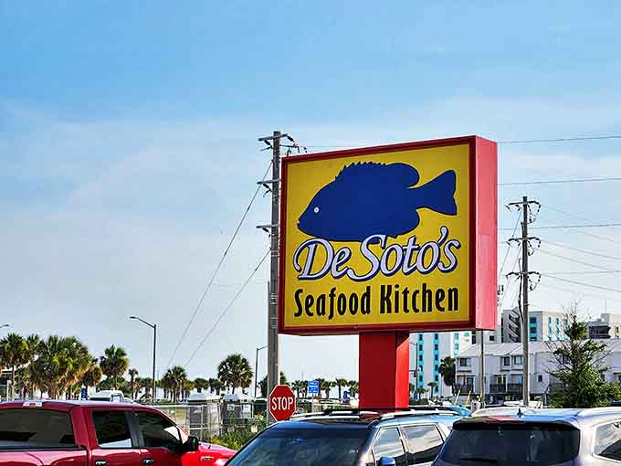 That iconic yellow sign with its blue fish silhouette &ndash; a beacon of hope for hungry travelers and a symbol of Gulf Shores tradition.