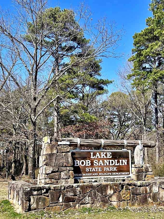 The entrance sign: your official permission slip to abandon adulting for however long you've booked your stay.