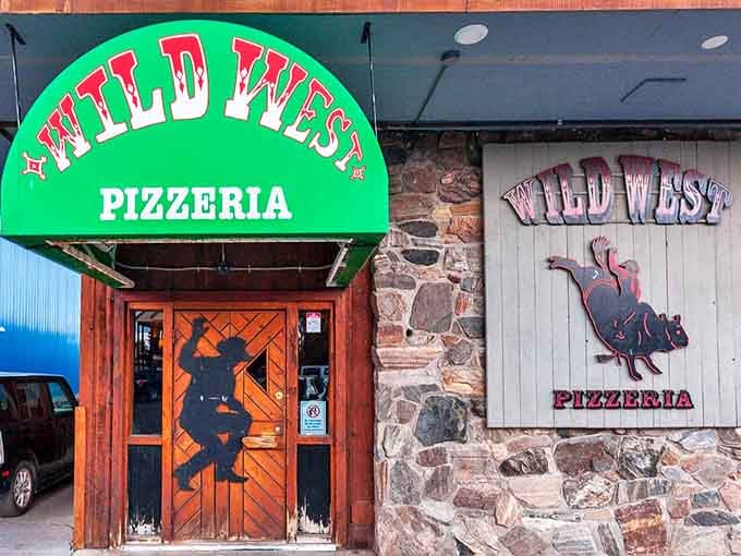 The entrance announces itself with unmistakable frontier flair—a bucking bronco silhouette promising wild times and wilder flavors within.