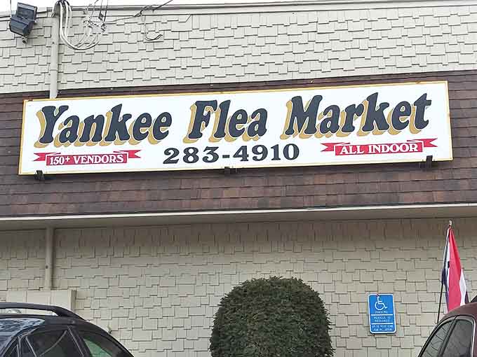The sign says it all – over 150 vendors under one roof, a promise of treasure hunting that draws people from across New England every weekend.