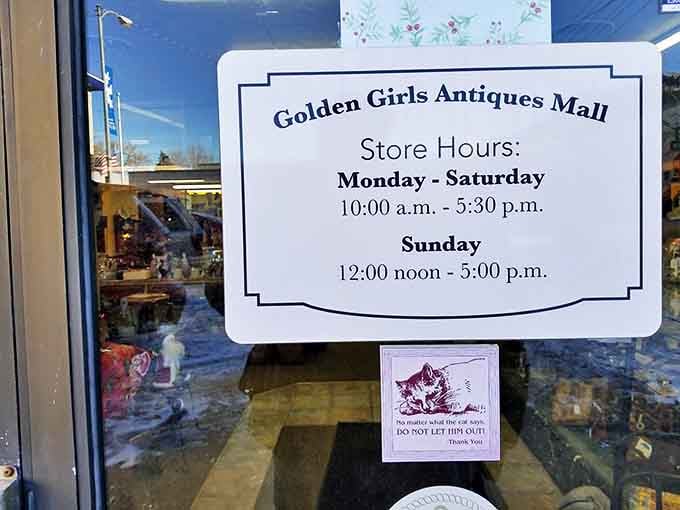 Even the store hours sign has personality&mdash;and a gentle reminder that the resident cat prefers to stay indoors.