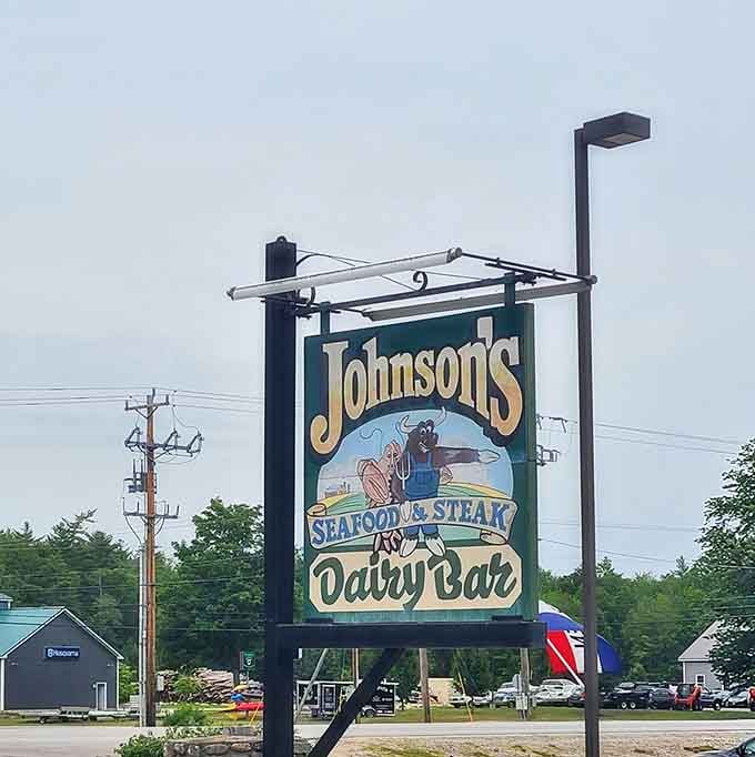 The classic Johnson's sign promises three essential food groups: seafood, steak, and ice cream&mdash;the holy trinity of Lakes Region dining.