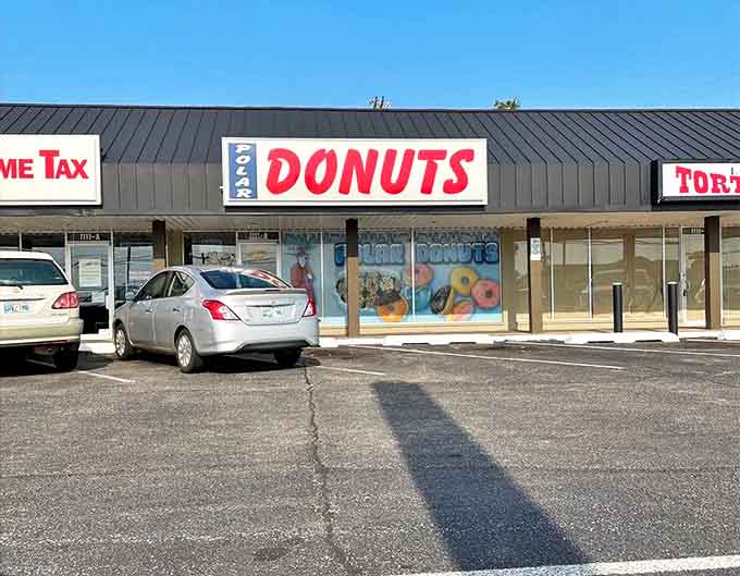 The humble storefront houses donut greatness, proving once again that the best food experiences often hide in plain sight.