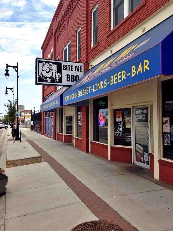 The street view reveals what locals already know: behind that blue awning and pig sign lies a temple of smoke where barbecue dreams come true.