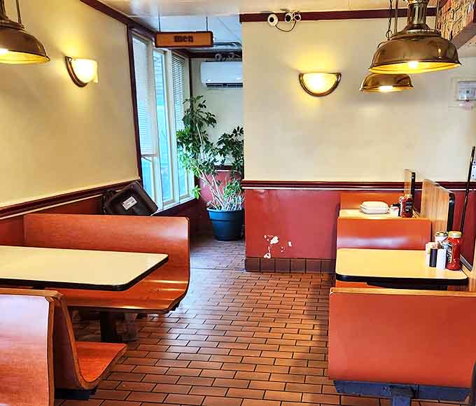 The warm wood tones and classic diner aesthetic create the perfect backdrop for memories made over maple syrup and coffee.