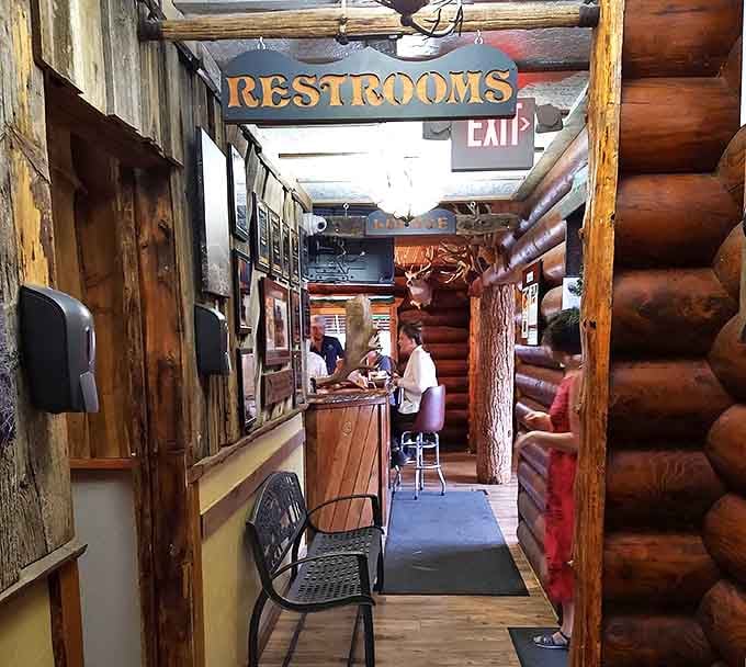 Even the path to the restrooms feels like a journey through an authentic Western lodge. Those log walls have heard every "I'm so full" comment ever uttered.