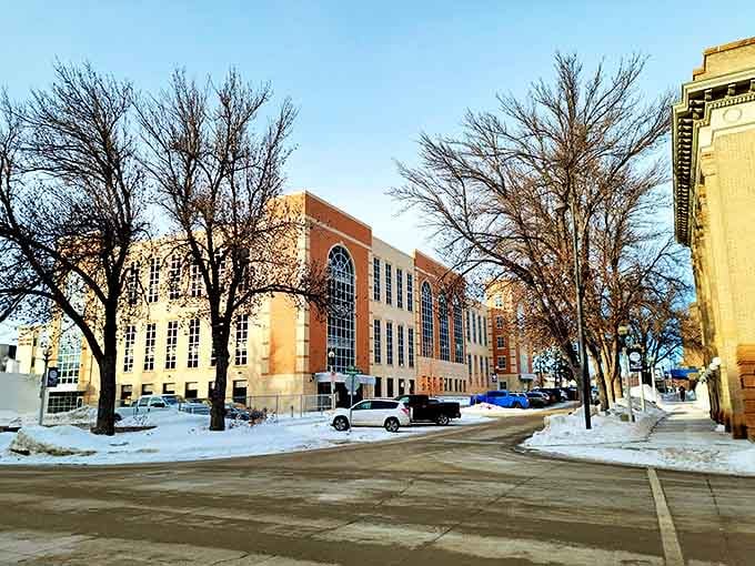 Winter transforms government buildings into postcard-worthy scenes, where snow provides free seasonal redecorating that lasts for months.