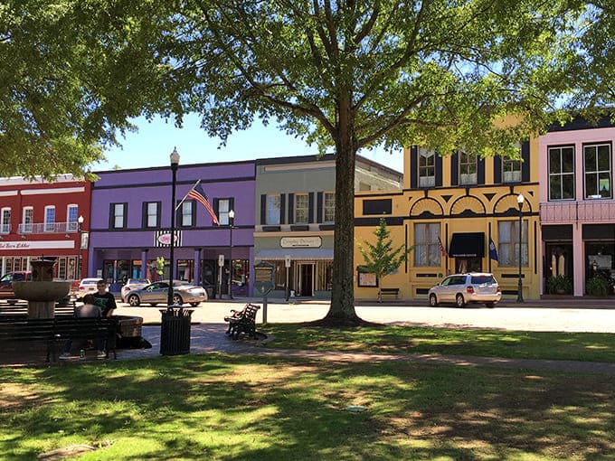 Abbeville's rainbow-colored storefronts look like they were painted by an artist who couldn't decide on just one happy color.