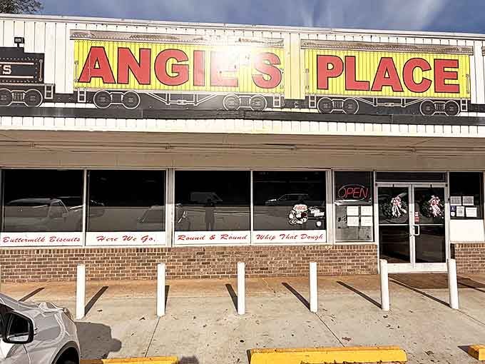 The iconic train-themed sign at Angie's Place promises a journey for your taste buds that's worth every mile of the trip.
