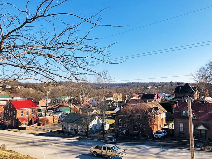 Hermann's hillside view captures small-town Missouri magic, with colorful buildings nestled against rolling countryside like a painter's dream.