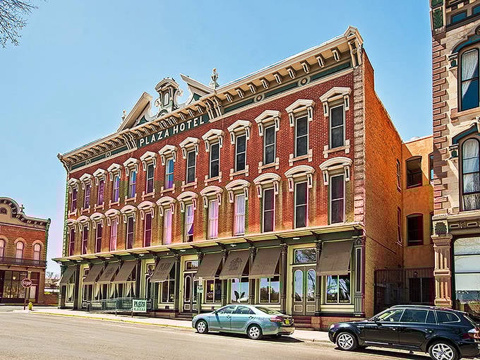 The historic Plaza Hotel stands proudly in Las Vegas, NM, a brick beauty that's seen more history than a Ken Burns documentary.