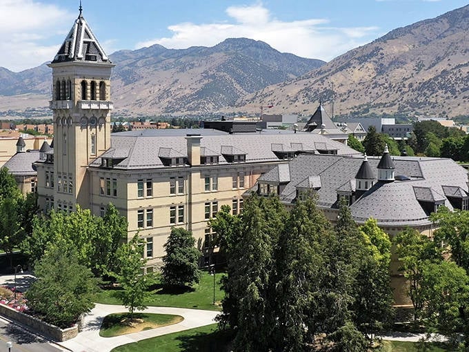 Old Main at Utah State University stands like a proud grandfather watching over Logan, its tower reaching skyward as if checking the weather for us all.