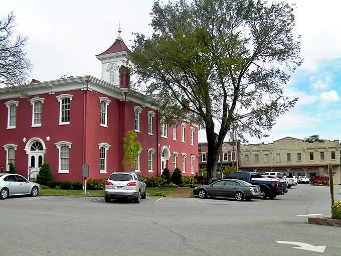 That red brick courthouse stands like a proud sentinel, watching over Lynchburg's timeless town square with unwavering dignity.