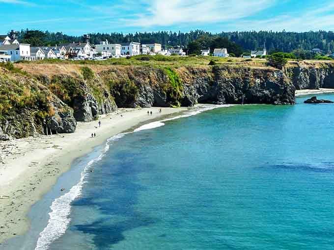 Mendocino's clifftop homes stand like sentinels above the beach, where every sunset feels like the climax of a love story.