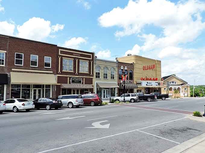 Winchester's historic downtown square, where time slows down and the Oldham Theater marquee still lights up the evening with vintage charm.