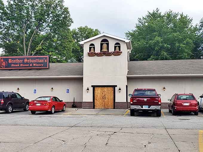 The rustic wooden doors and lantern-style lights create an inviting entrance to this unique dining destination.