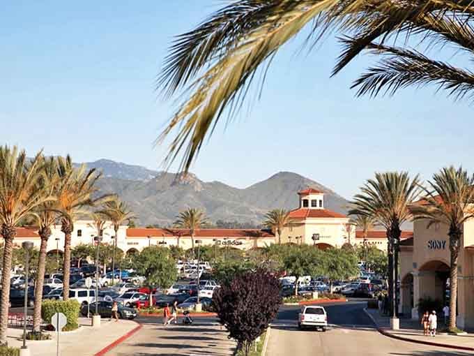 Mountains frame this shopping oasis. Like a mirage in the desert, except the bargains are delightfully real.