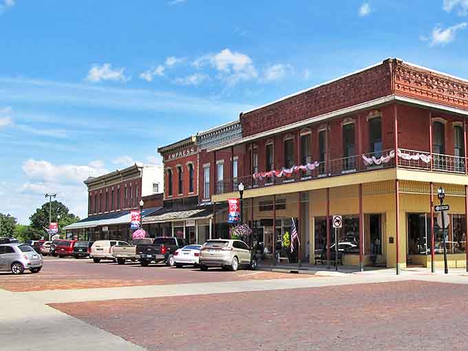Downtown Fort Scott's brick storefronts and patriotic decorations create a Norman Rockwell painting come to life.