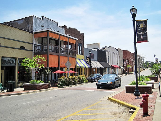 Classic small-town charm meets modern convenience in this bustling Arkansas downtown that never forgot its roots.