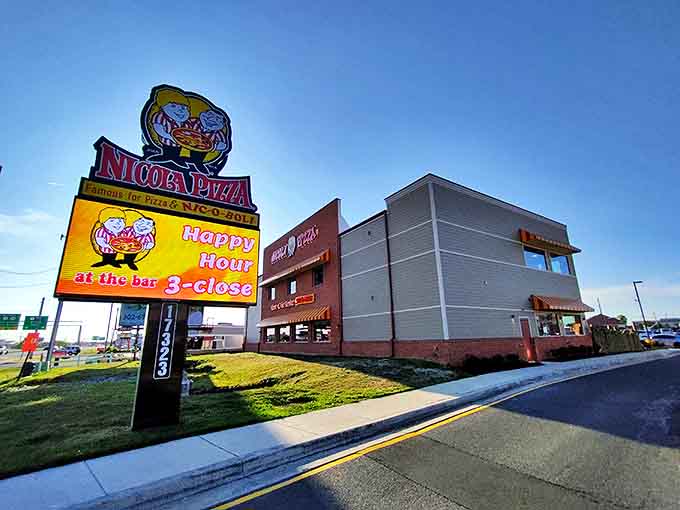 The iconic Nicola Pizza sign stands tall against the blue Delaware sky. Happy hour at the bar? Don't mind if I do!
