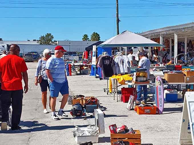 The outdoor bazaar spreads like a small city of deals, with shoppers wandering between vendor stalls.