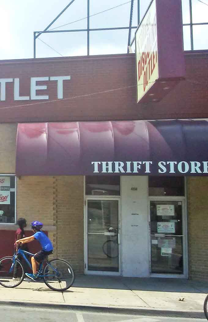 The purple awning and simple signage &ndash; a portal to another dimension where twenty dollars transforms into an entire wardrobe.