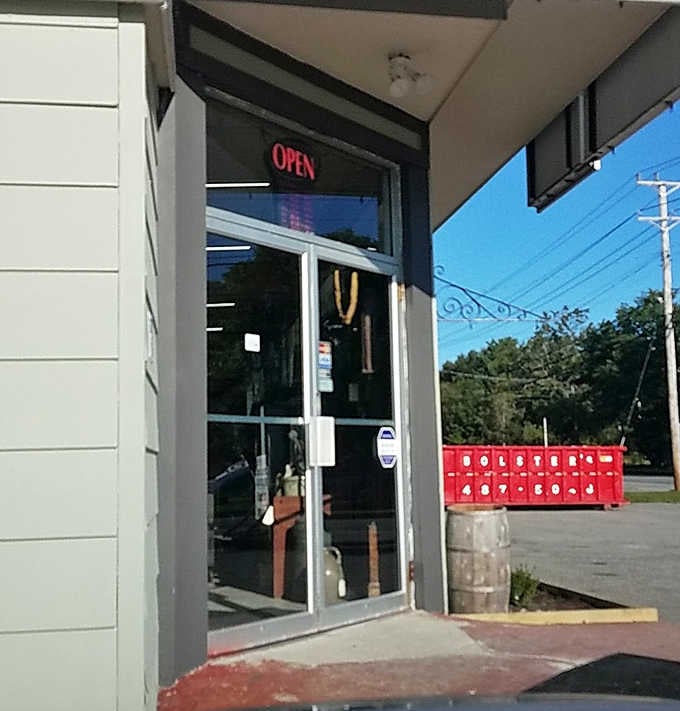 The unassuming entrance belies the wonderland within. That glowing "OPEN" sign is your portal to yesterday's treasures waiting to be rediscovered.