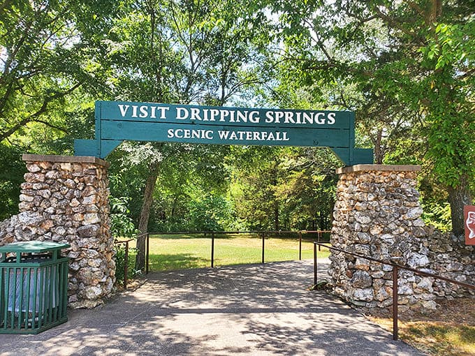 "Visit Dripping Springs" - the stone archway might as well say "Enter Enchantment." This gateway promises adventure beyond the ordinary Oklahoma landscape.
