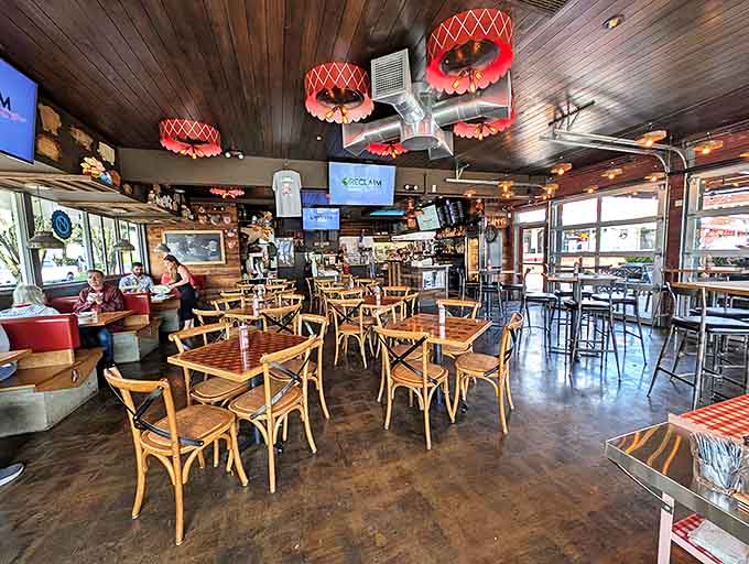 Inside, wooden tables beneath distinctive red lampshades create the perfect staging area for the meat feast about to unfold. Come hungry, leave happy.