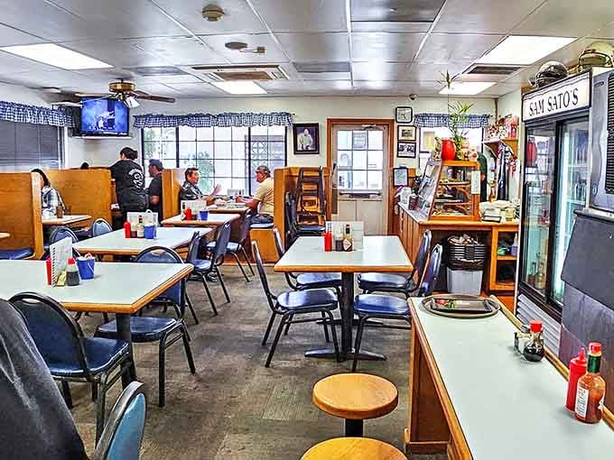 Inside, formica tables and blue checkered curtains create a time capsule of local dining. No Instagram filters needed&mdash;this is authentic Hawaii.