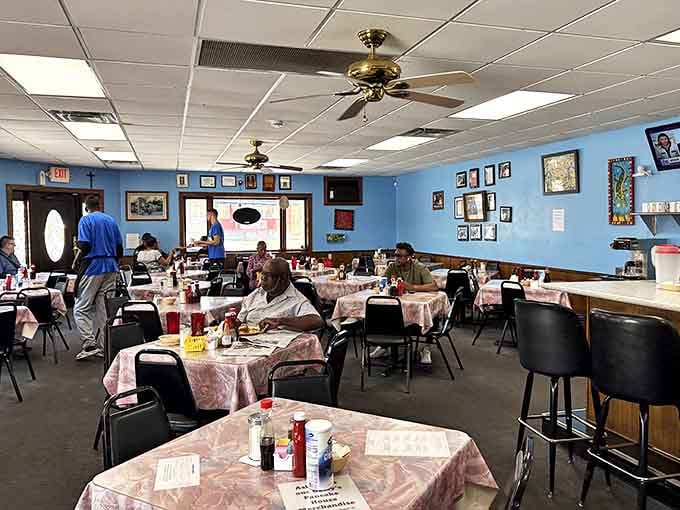 Inside, blue walls and checkered tablecloths create the perfect backdrop for morning conversations and coffee refills that never seem to end.
