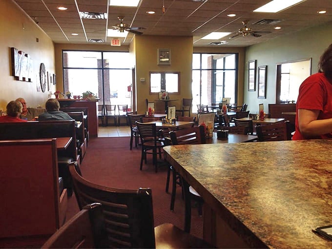 Cozy booths and warm wood tones create the perfect backdrop for conversations that meander like a country road, unhurried and full of unexpected delights.