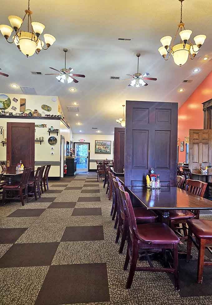 Inside, the checkered floor and warm lighting create that perfect small-town ambiance where calories don't count and conversations flow as freely as the coffee.