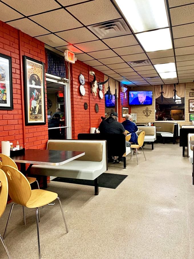 Inside, the unpretentious red brick walls and simple booths create the perfect backdrop for the serious eating that's about to happen.