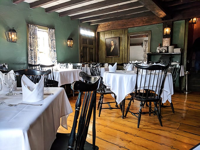 Where founding fathers might have plotted revolution. Windsor chairs and wide-plank floors create an atmosphere that makes even Tuesday dinner feel historically significant.