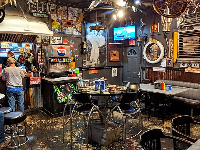 Step inside and you're transported to burger paradise by way of an actual junkyard &ndash; where license plates and automotive memorabilia create the perfect backdrop for culinary magic.