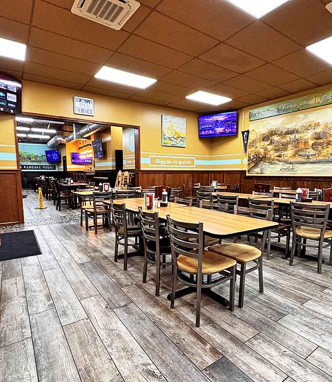 Yellow walls and wooden wainscoting create that perfect diner vibe&mdash;casual enough for bedhead, worthy enough for weekend plans.