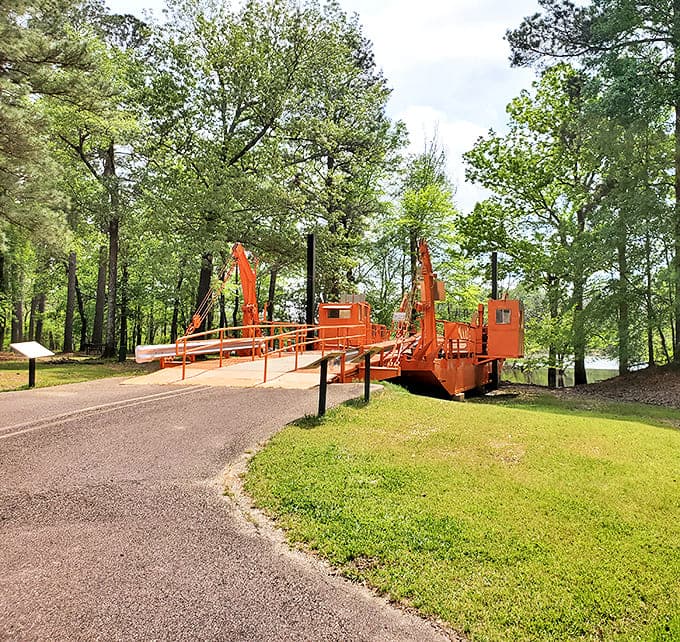 The iconic orange ferry, now permanently docked, stands as a cheerful reminder of river crossings past &ndash; like a retirement home for boats with stories to tell.