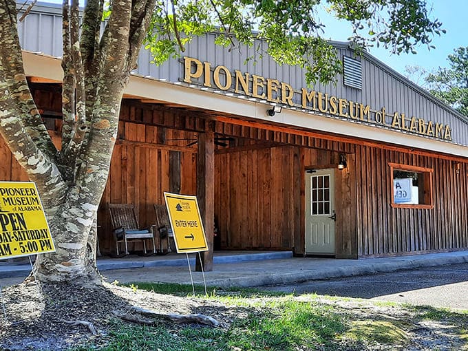 The Pioneer Museum's rustic wooden facade invites you to step back in time, where Alabama's history comes alive through authentic artifacts and stories.
