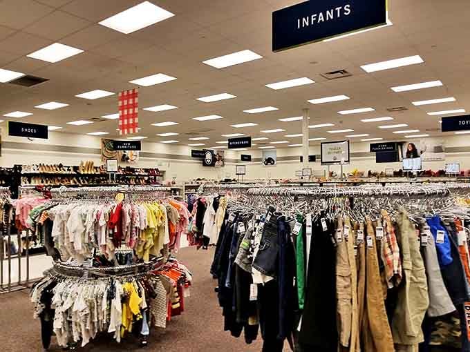 A sea of clothing racks stretches to the horizon, organized with military precision. Finding your size has never been this adventurous.