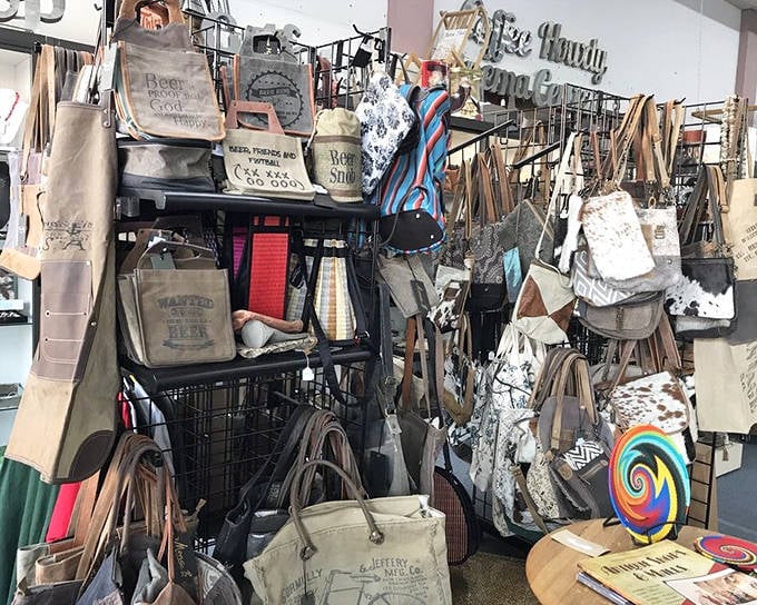 Canvas totes and vintage-inspired bags hang like time capsules waiting to be carried home. Each one practically whispers, "I've got stories to tell."