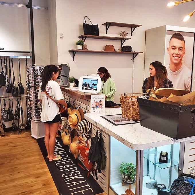 Where fashion dreams and budget realities meet harmoniously. The sleek checkout counter feels more boutique than bargain, proving thrift can be downright luxurious.