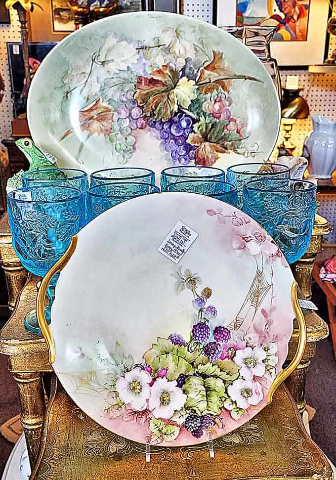 These aren't just dishes—they're conversation pieces with pedigrees! Vintage plates and azure glassware that would make your grandmother swoon with recognition.