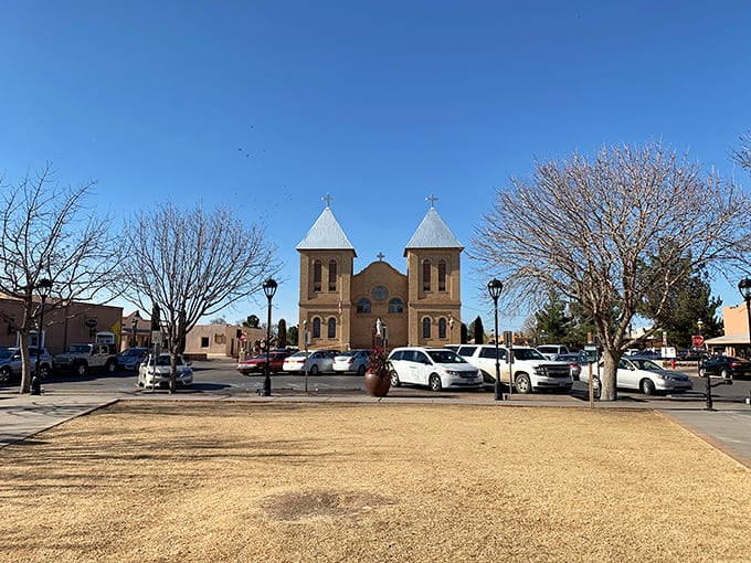 San Albino Basilica's twin bell towers have watched over Mesilla Plaza for generations, standing sentinel against the impossibly blue New Mexico sky.