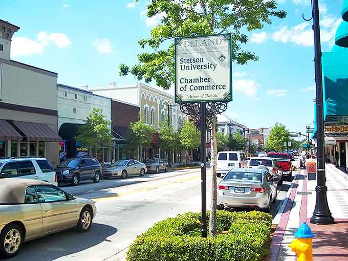 Downtown DeLand's welcoming streetscape invites visitors to explore its brick-lined sidewalks and locally-owned businesses beneath Florida's endless blue sky.