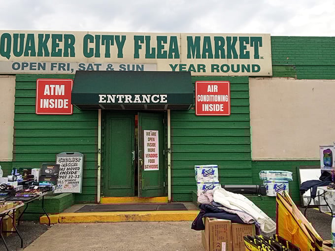 That iconic green entrance promises air conditioning inside—the universal language of "come spend hours browsing in comfort."