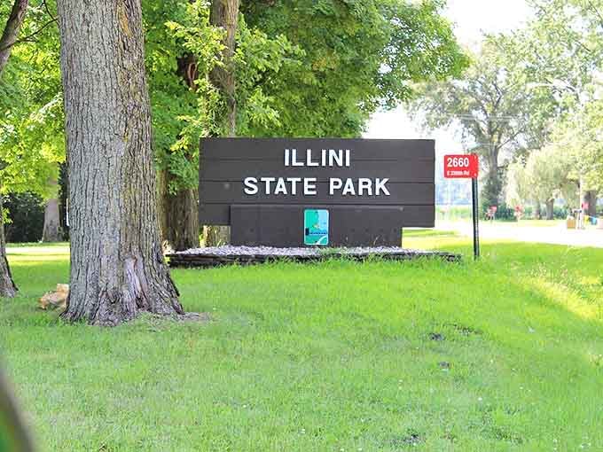 No flashy neon or digital billboards here &ndash; just a humble wooden sign that might as well say "Welcome to your next favorite discovery."