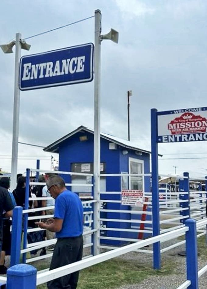 The official entrance gate stands ready to welcome another wave of eager treasure hunters and curious wanderers.