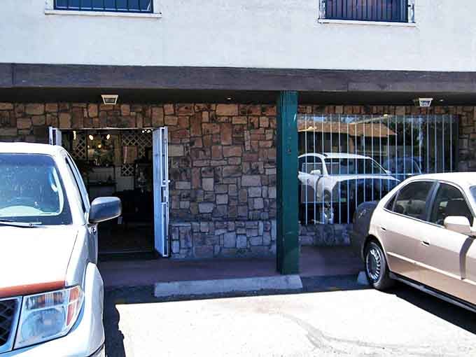 The unassuming stone facade hides a universe of wonders, like finding Narnia behind an ordinary wardrobe door.